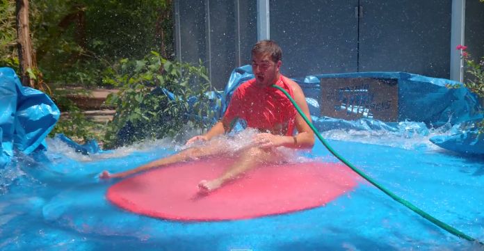 This Guy Squeeze Himself Inside a Balloon and Popping it in Slow Motion ...