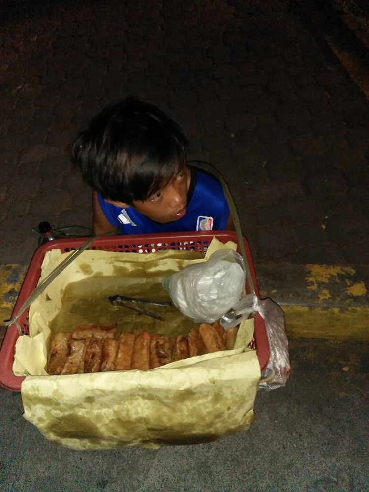 Viral: Young Boy Selling Food Every Night To Help Sick Grandma