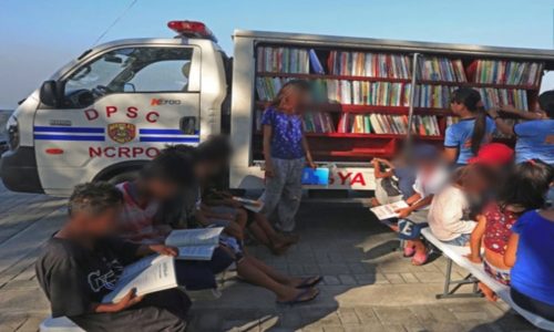 Police Officers Use Mobile Library To Teach Street Children