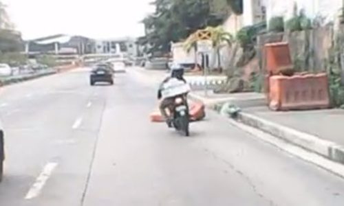 Motorcycle Rider Crashes Into Plastic Barrier Goes Viral (Video)