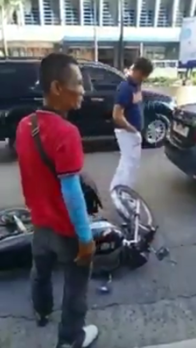 Car Driver Slams Motorcycle Rider During Vehicular Accident