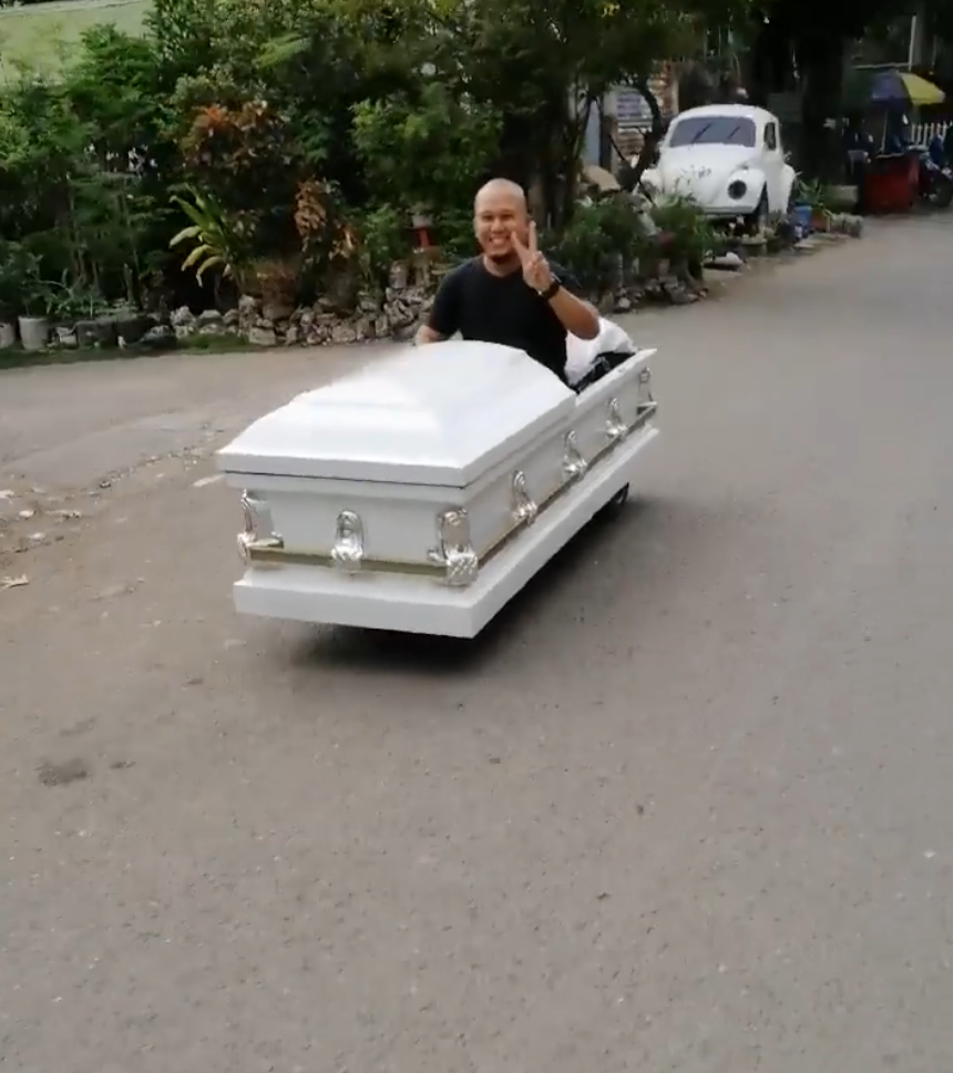 Witty Driver Riding a Vehicle Made of Coffin Goes Viral on Social Media