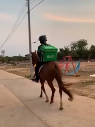 Grab Food Rider Riding Horse Goes Viral Online - PhilNews