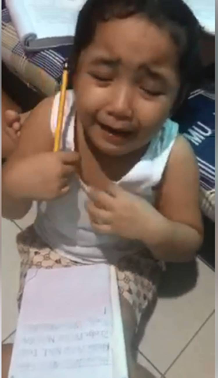 Adorable Girl Cries While Writing Her Lengthy Name on Notebook