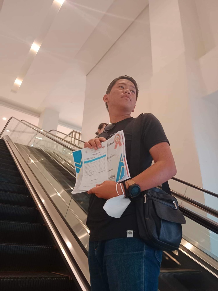Male Student Goes Viral for Flexing Academic Award Wherever He Goes