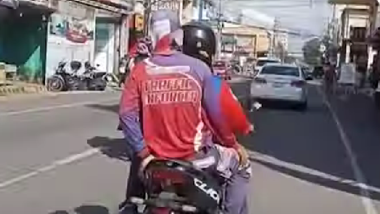 Traffic Enforcer Tickets Fellow Enforcer for Helmet Violation in Laoag City