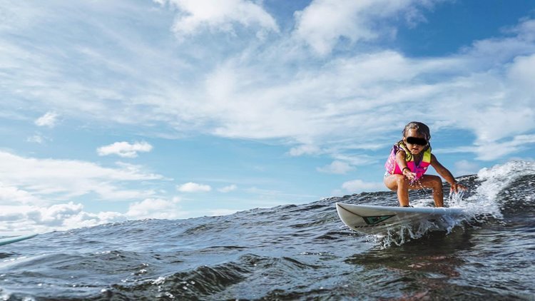 Siargao-Based Surfer Flexes Photos 4-Year-Old Daughter Surfing by Herself